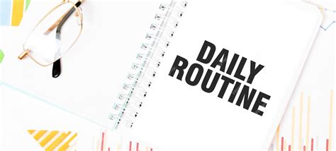 Premium Photo Text Daily Routine On White Notepad Glasses Graphs And Diagrams