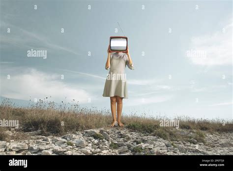 Surreal Woman With Her Head Hidden By A Tv That Projects The Disconnect Stock Photo Alamy