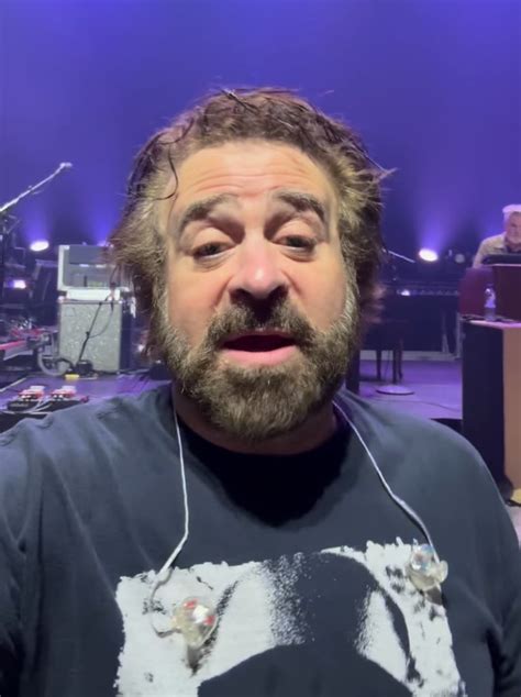 90s Rocker Looks Totally Different Without Signature Hairstyle Over 30