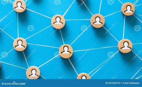 A Network Of Wooden Figures Connected By Lines On A Blue Background