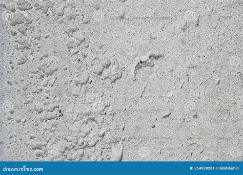 grey background of concrete plaster uneven rough surface stock image