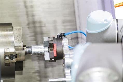 Robot Arm Auto Load And Unload Cnc Turning Part Stock Image Image Of Automation Manufacture