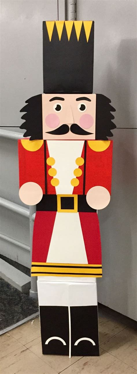 A Cardboard Nutcracker With A Mustache And Moustache