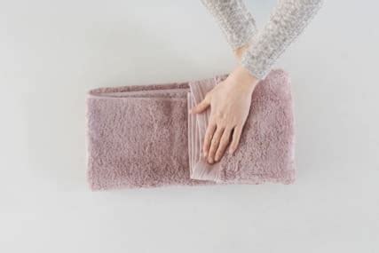 How to fold towels: Simple towel styling tricks to roll or fold towels | Style Curator
