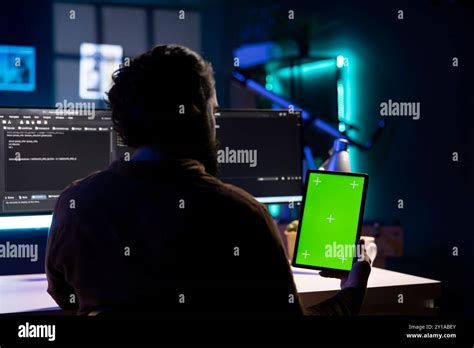 Cybersecurity Expert Using Isolated Screen Tablet To Look For Security
