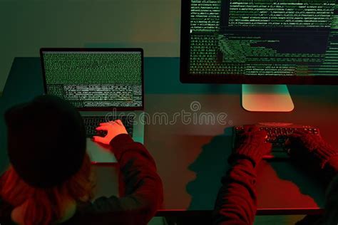 Anonymous People Using Computer And Programming To Break Code Cyber