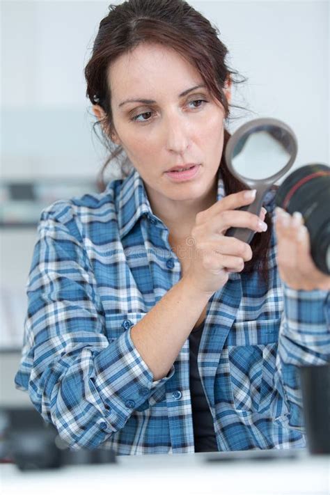 Female Photographer Using Magnifying Glass Stock Image Image Of Adult