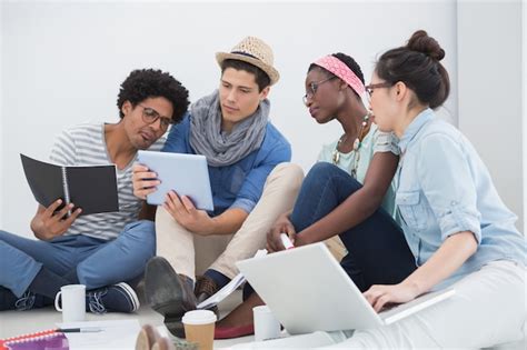 Premium Photo Young Creative Team Brainstorming Together