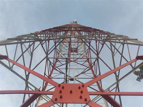 A Lonely Cellular Network Tower Is Seen Against A Clear Blue Sky Gps 3g 4g 5g Signal