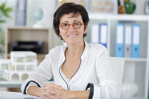 Female Architect Manager Looking At Camera Photo Background And Picture For Free Download Pngtree