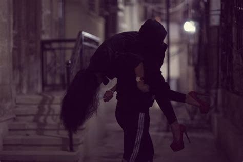 A Man Is Carrying A Woman On His Shoulder Like A Trophy Freeones