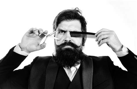 Premium Photo Bearded Barber Man In Barbershop Scissors And Straight