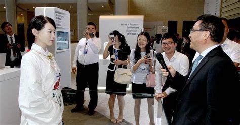 Cute Female Robot Malfunctions After Many Guests Stared At Her Too Much At An Event Photos