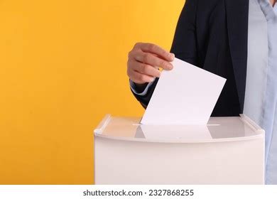 Woman Putting Her Vote Into Ballot Stock Photo 2327868255 Shutterstock