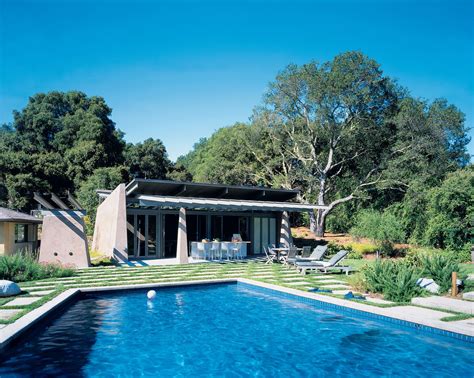 Modern Pool House Design With Colored Concrete Walls