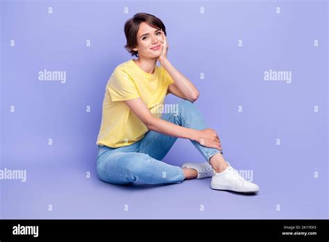 Full Body Photo Of Gorgeous Satisfied Lady Sit Floor Hand Touch Cheek