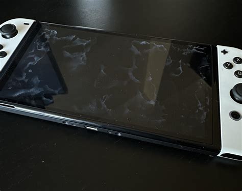 Weird Markings On OLED Screen R Switch