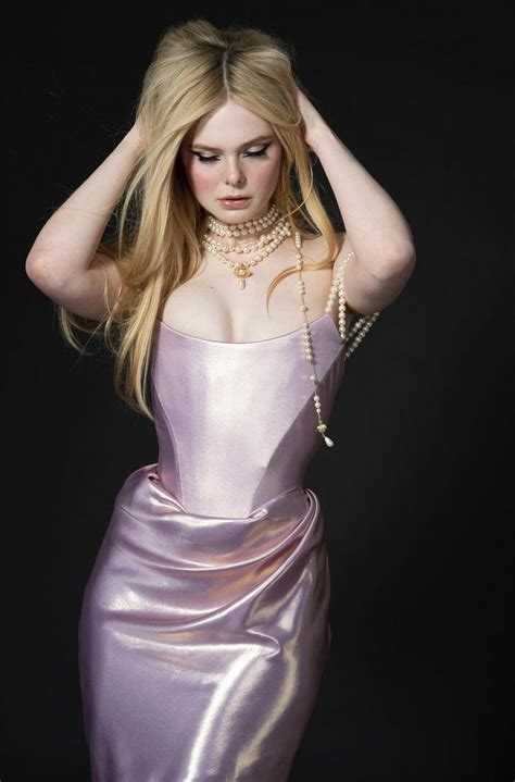 Elle Fanning In A Tight Corset And Pearls On The Spirit Awards Red