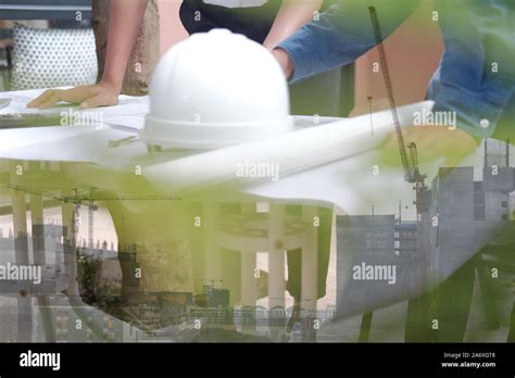 Architect Engineer Working On House Blueprint Of Real Estate Project At
