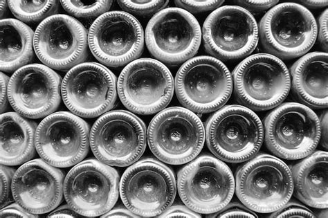 Premium Photo Full Frame Shot Of Stacked Glass Bottles