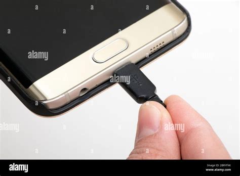 Connecting Mobile Phone With USB Type Micro B Stock Photo Alamy