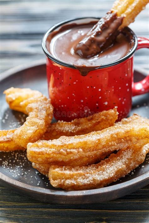 Churros Con El Chocolate Caliente Imagen De Archivo Imagen De Madera Pasteles 103885435