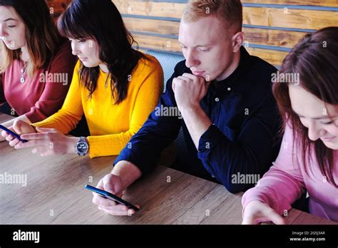 Millennials Use Mobile Phones Young People Type Text Messages On Smartphones Communication