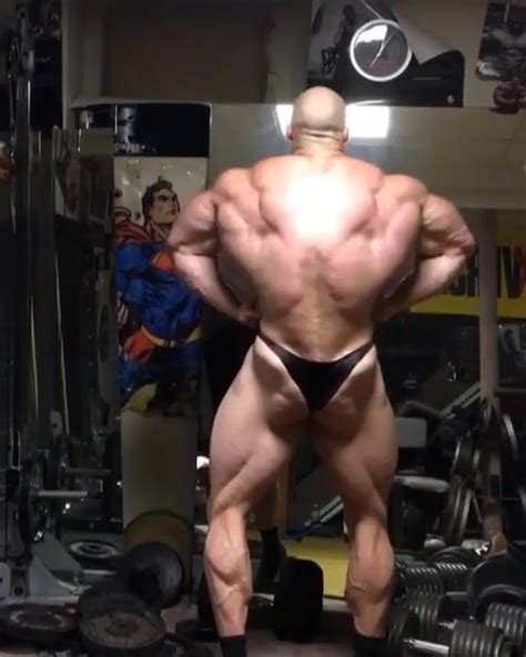 Bald Muscle Giant Posing
