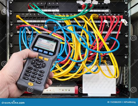 network test qualified cable performance tester in human hand detail