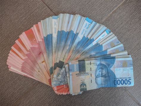 Stack Of Indonesian Banknotes With A Nominal Value Of Fifty Thousand Rupiah And One Hundred