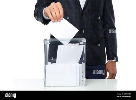 Man Putting Ballot Into Voting Box Isolated On White Background Stock Photo Alamy