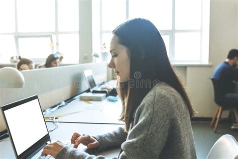 An Adult Girl Uses A Laptop With A Blank White Screen For Mockup Stock Image Image Of Mockup