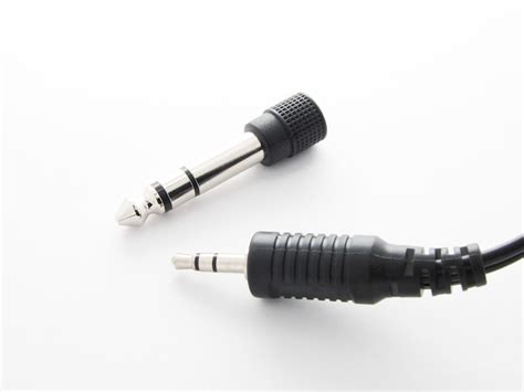 Premium Photo Adapter For Audio Connection Of Different Devices On A White Background
