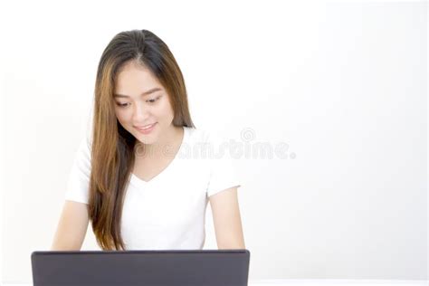 Beautiful Young Asian Woman Sitting In Front Of Laptop Computer Stock