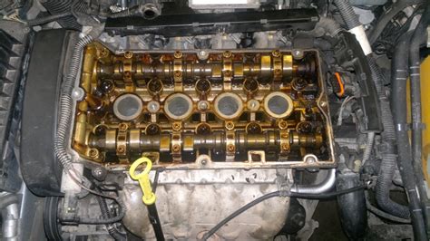 теплообменник и клапанная крышка — Opel Astra H, 1,8 л, 2007 года ...