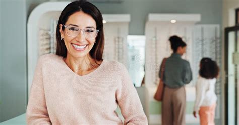 Healthcare Optician And Portrait In Optometry Store For Glasses