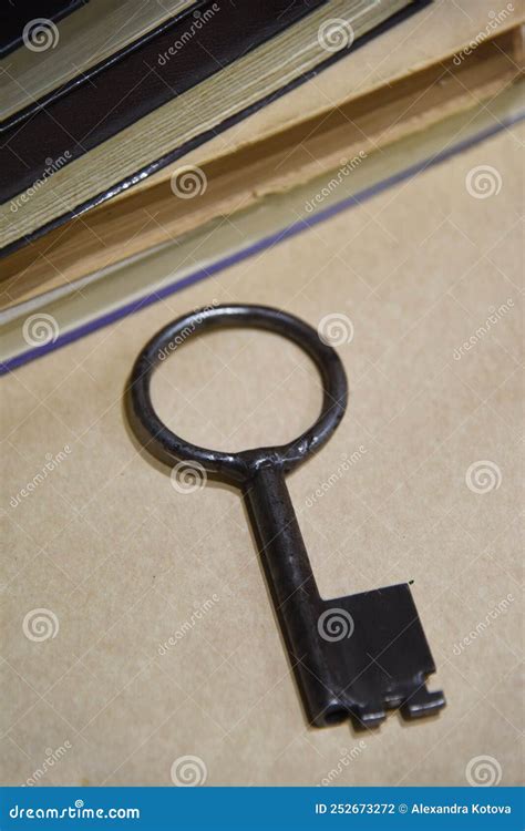 Old Metal Key On Paper Stock Photo Image Of Rustic 252673272