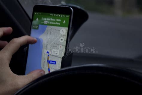 Man Using Google Maps On Smartphone Editorial Photo Image Of