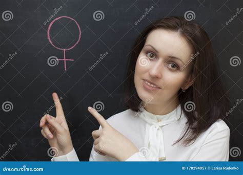 Teacher Girl At The Chalkboard Shows The Gender Symbol Of A Woman Sex Ed Stock Image Image Of
