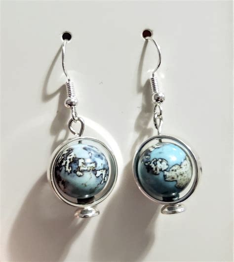 Tiny Globe Earrings By Thefluidline On Deviantart