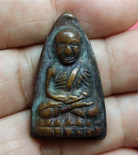 รูปหล่อโบราณพิมพ์เตารีด หลวงปู่ทวดวัดช้างให้ ปี 2505 Ennxo