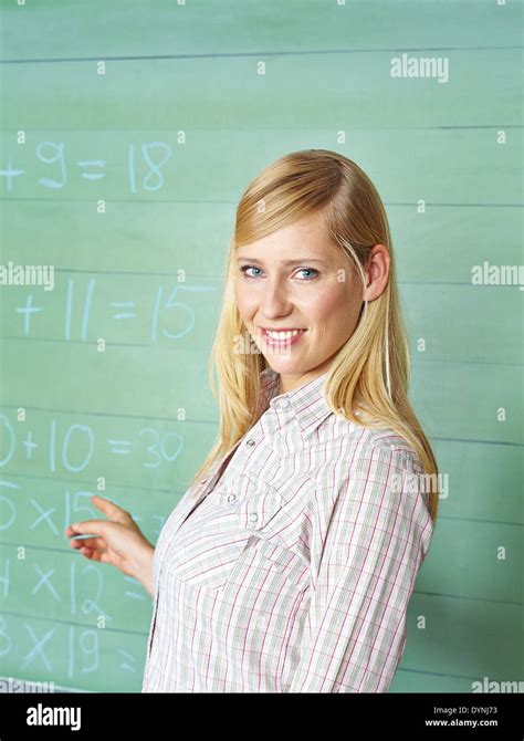 Teacher Pointing Blackboard Hi Res Stock Photography And Images Alamy