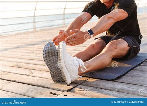 Handsome Young Sportsman Make Exercises On Sport Carpet Stock Image Image Of Nature Handsome Young Sportsman Make Exercises On Sport Carpet Stock Image Image Of Nature