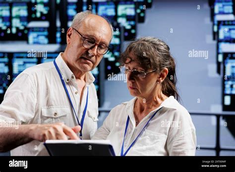 Old Coworkers Monitoring Data Center Clusters Optimizing Them For Data