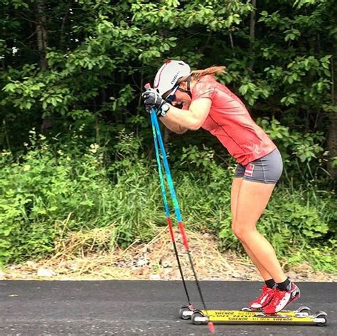 Woman Skateboarding Down a Street