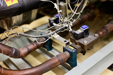 Solenoid Valve To Control The Flow In The Copper Pipe Stock Photo Adobe Stock