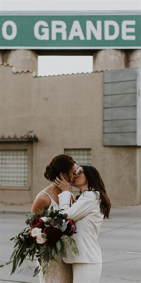 Two Brides Share A Kiss On Their Wedding Day Colorado Wedding Intimate Wedding Photography