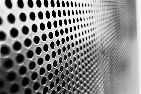 Premium Photo Abstract Close Up Of Perforated Metal Surface Modern Industrial Texture And Pattern