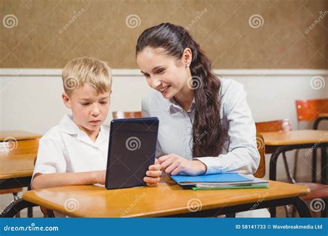 Teacher Helping A Student In Class Stock Image Image Of Profession Knowledge 58141733