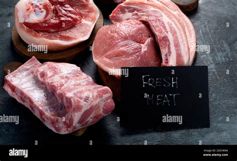 Different Types Of Raw Meat On Black Background Foods High In Protein